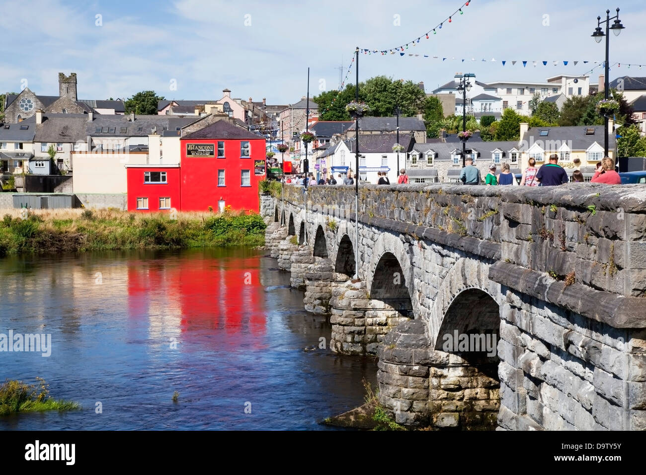 Pedestrians on a bridge crossing a river;Killorglin county kerry ...