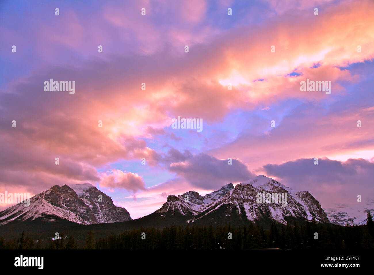 Canada, Banff National Park, Sunset Color over Mountains near Lake ...
