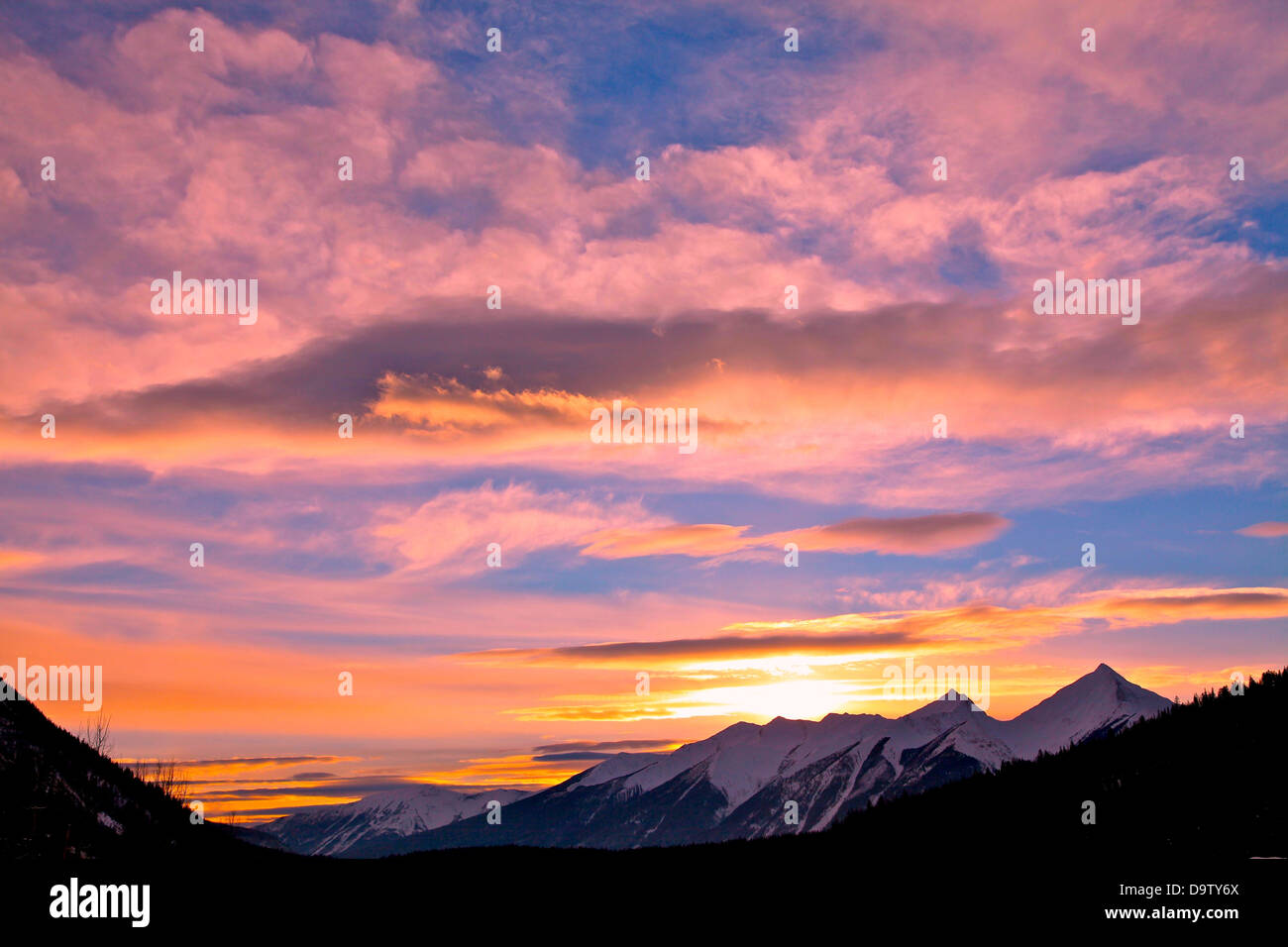 Canada, Banff National Park, Sunset Color over Mountains near Lake ...