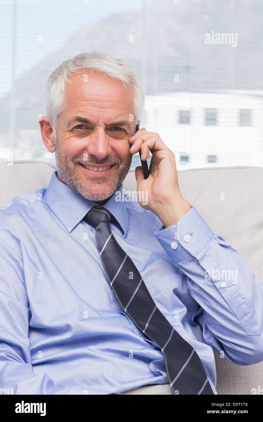 Businessman calling smartphone hi-res stock photography and images - Alamy