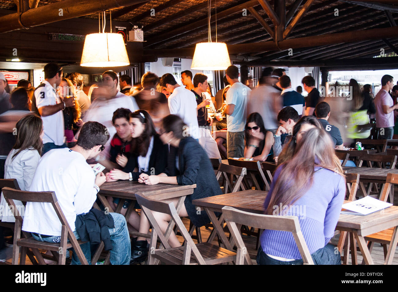 Young people gathering in Parador P12, a bar and lounge in Jurere ...