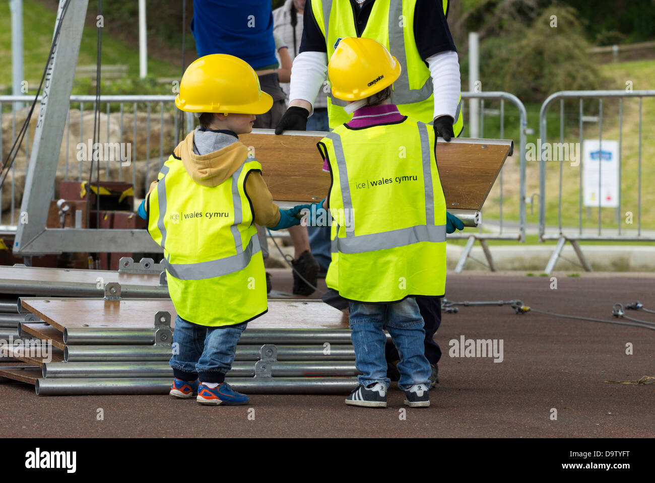 Children helping to build bridge at Institute of Civil Engineers stand ...