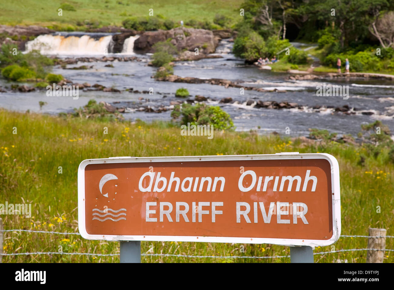 A sign for erriff river with the river and aasleagh waterfall in the ...