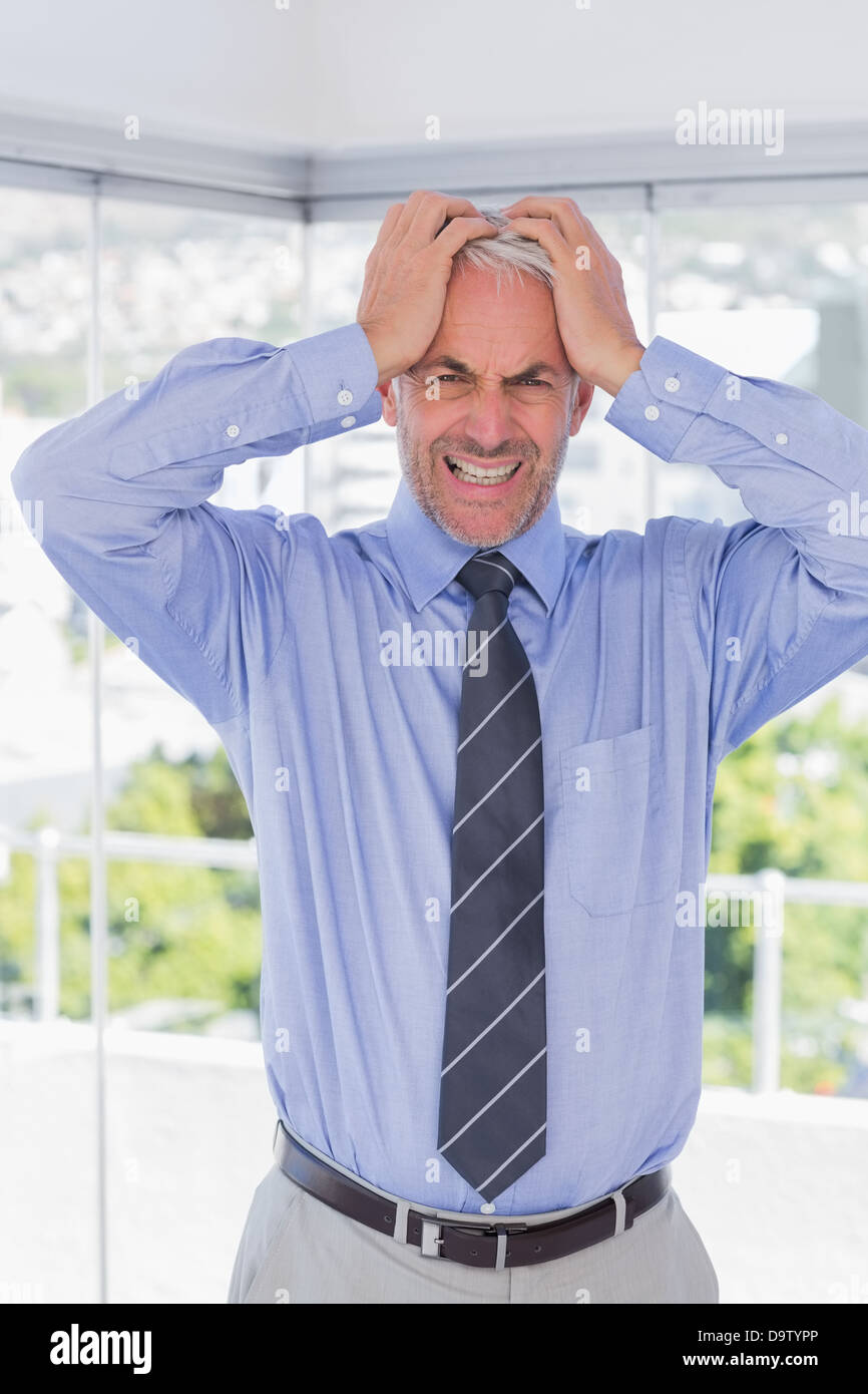 Hands on the head hi-res stock photography and images - Alamy