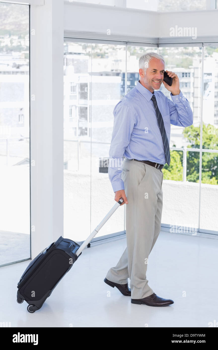 Pulling suitcase hi-res stock photography and images - Alamy