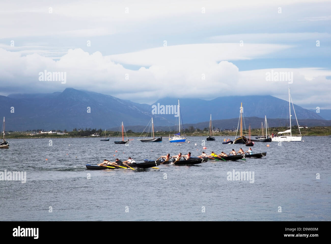 Boat races in the harbour at the roundstone regatta;Roundstone county ...