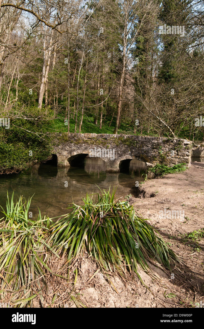 A Small Bridge over Bybrook River Castle Combe Wiltshire England UK ...