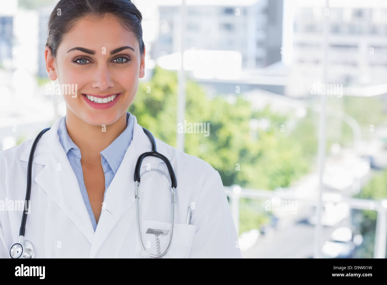 Young pretty female doctor hi-res stock photography and images - Alamy