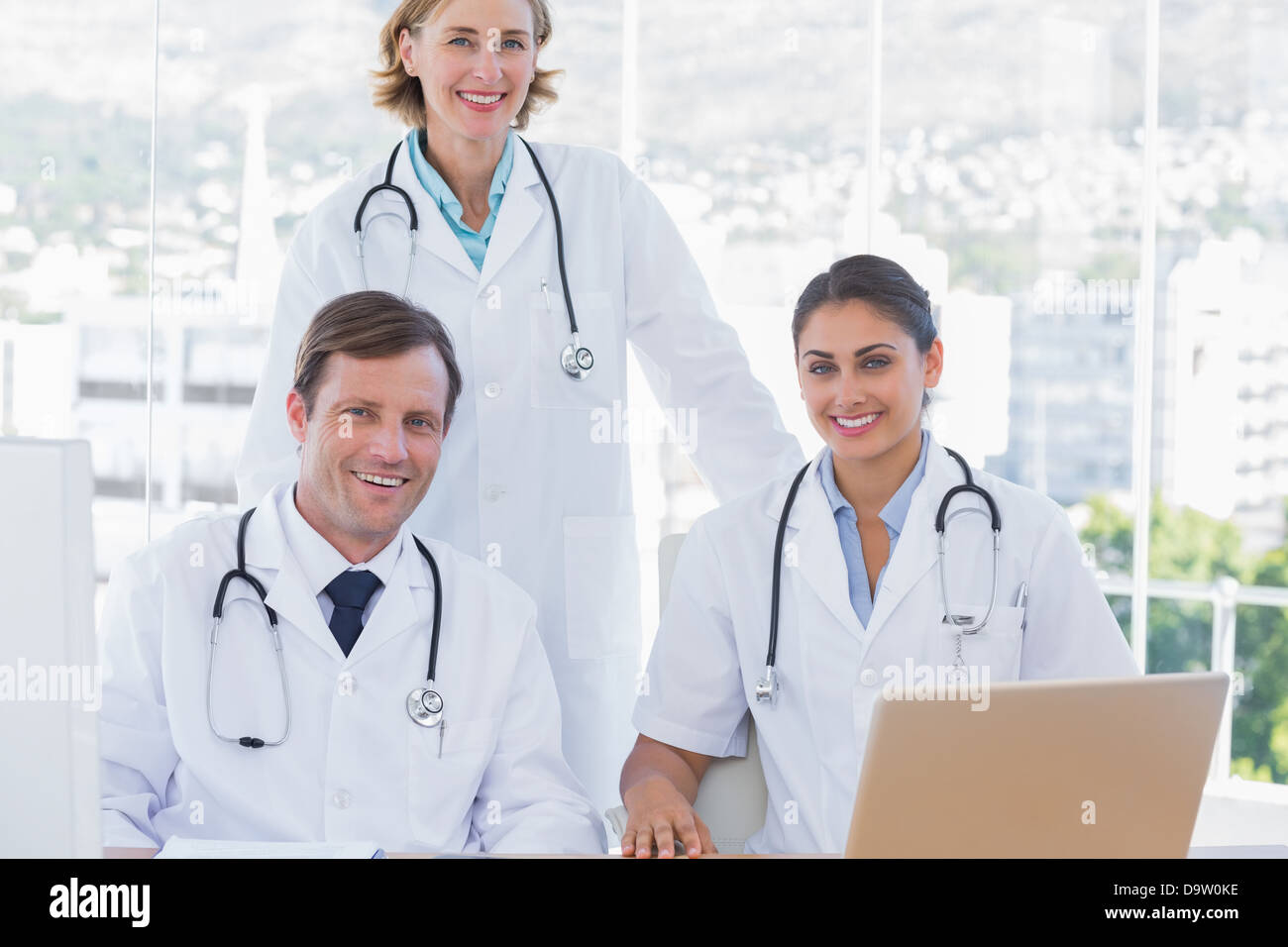 Group of doctors working together Stock Photo - Alamy