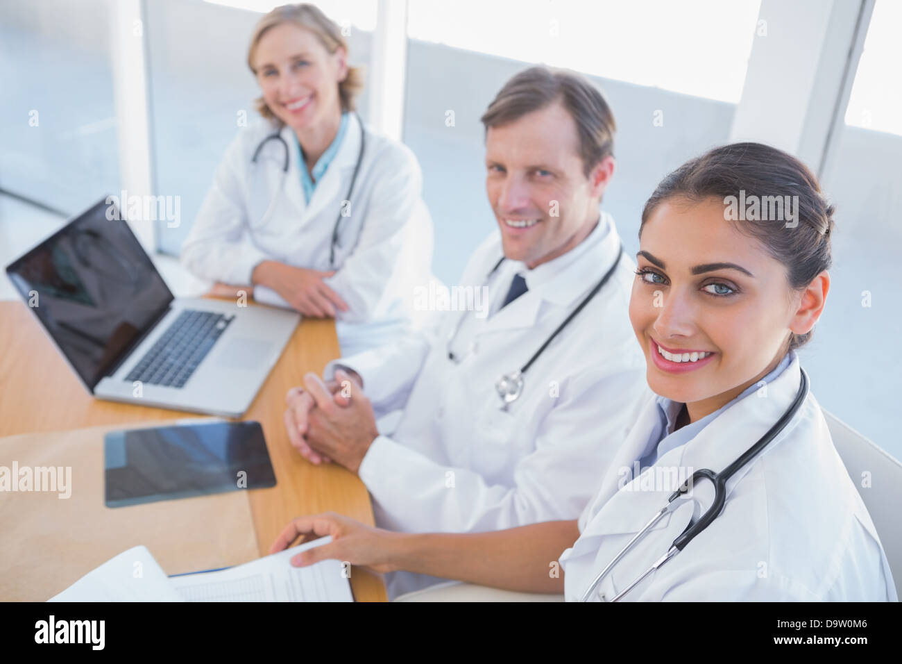 Overview of doctors looking at camera Stock Photo - Alamy