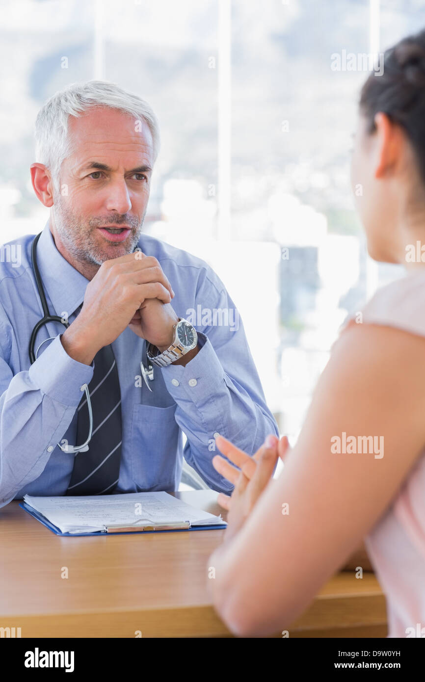 Doctor talking to patient Stock Photo - Alamy Doctor talking to patient Stock Photo - Alamy
