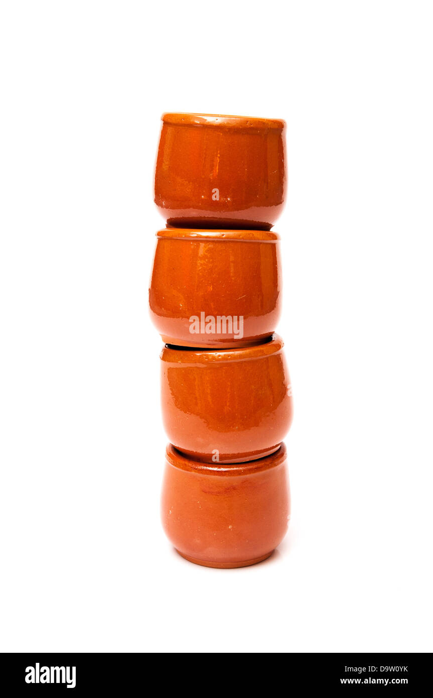 stack of ceramic vessels on a white background Stock Photo - Alamy