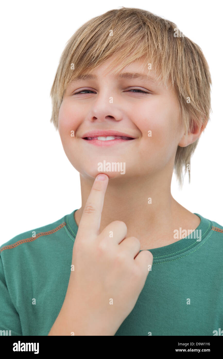 Smiling boy thinking Stock Photo - Alamy