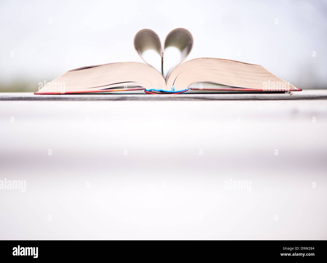 Bible pages heart hi-res stock photography and images - Alamy