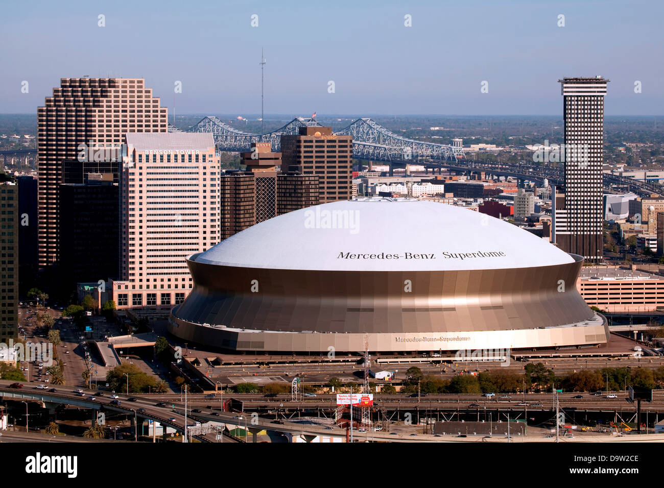 Aerial of the Superdome with the Crescent City Connection in the ...