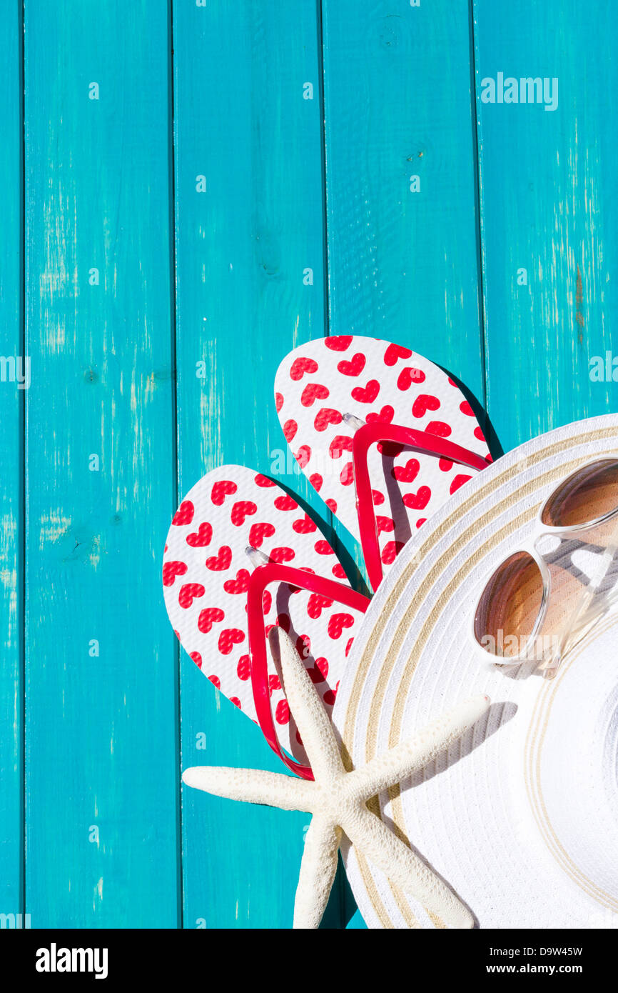Colorful flip flops by a swimming pool Stock Photo - Alamy