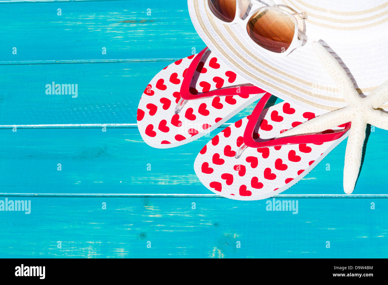 Colorful flip flops by a swimming pool Stock Photo - Alamy