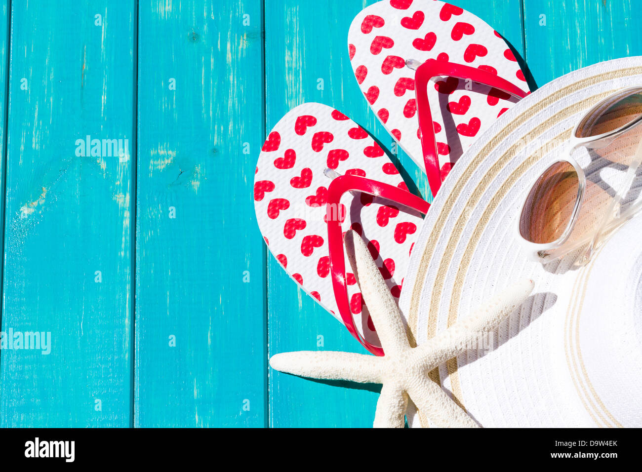 Colorful flip flops by a swimming pool Stock Photo - Alamy