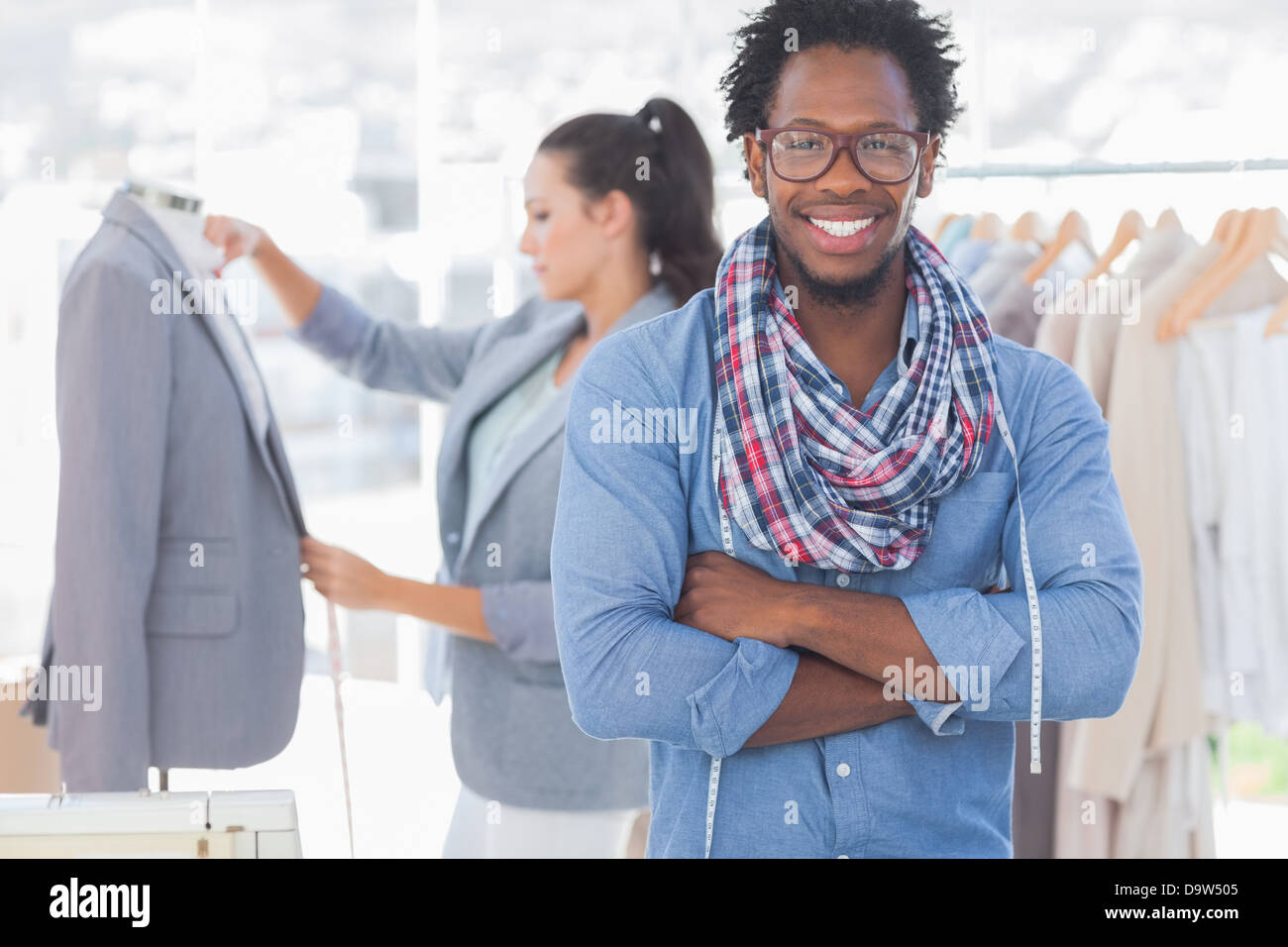 Fashion designer posing Stock Photo - Alamy