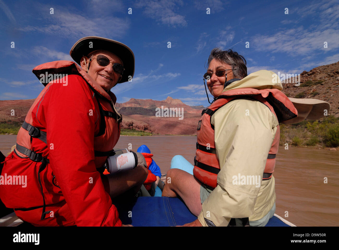 Couple smiling while rafting in the Colorado River, Grand Canyon ...