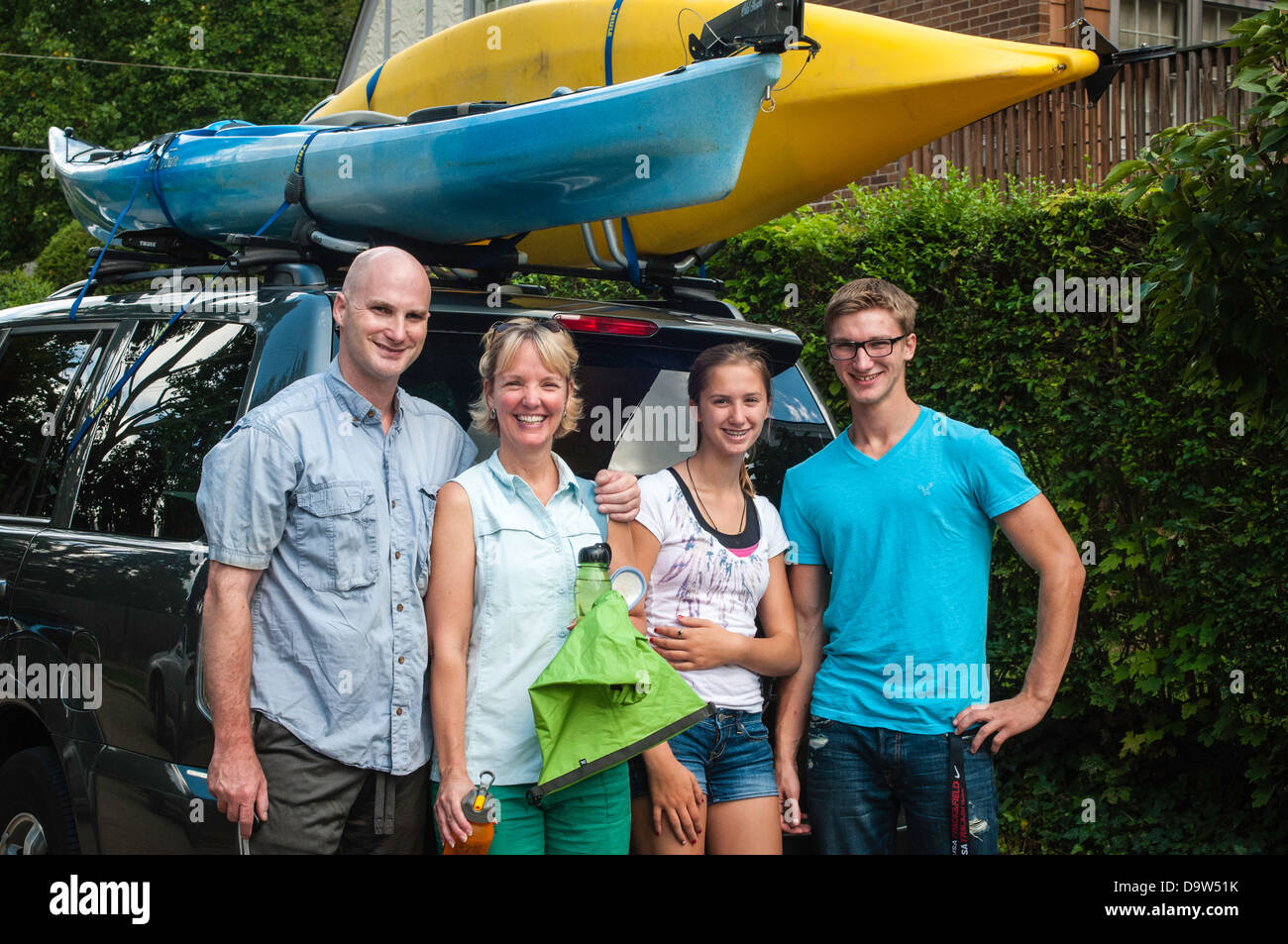 Kayak loading & preparation for holiday vacation getaway Stock Photo ...