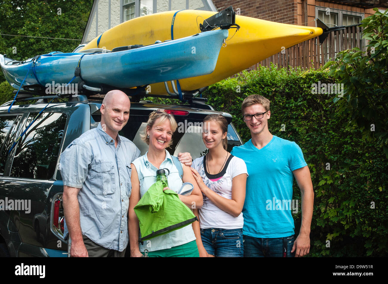 Kayak loading & preparation for holiday vacation getaway Stock Photo ...