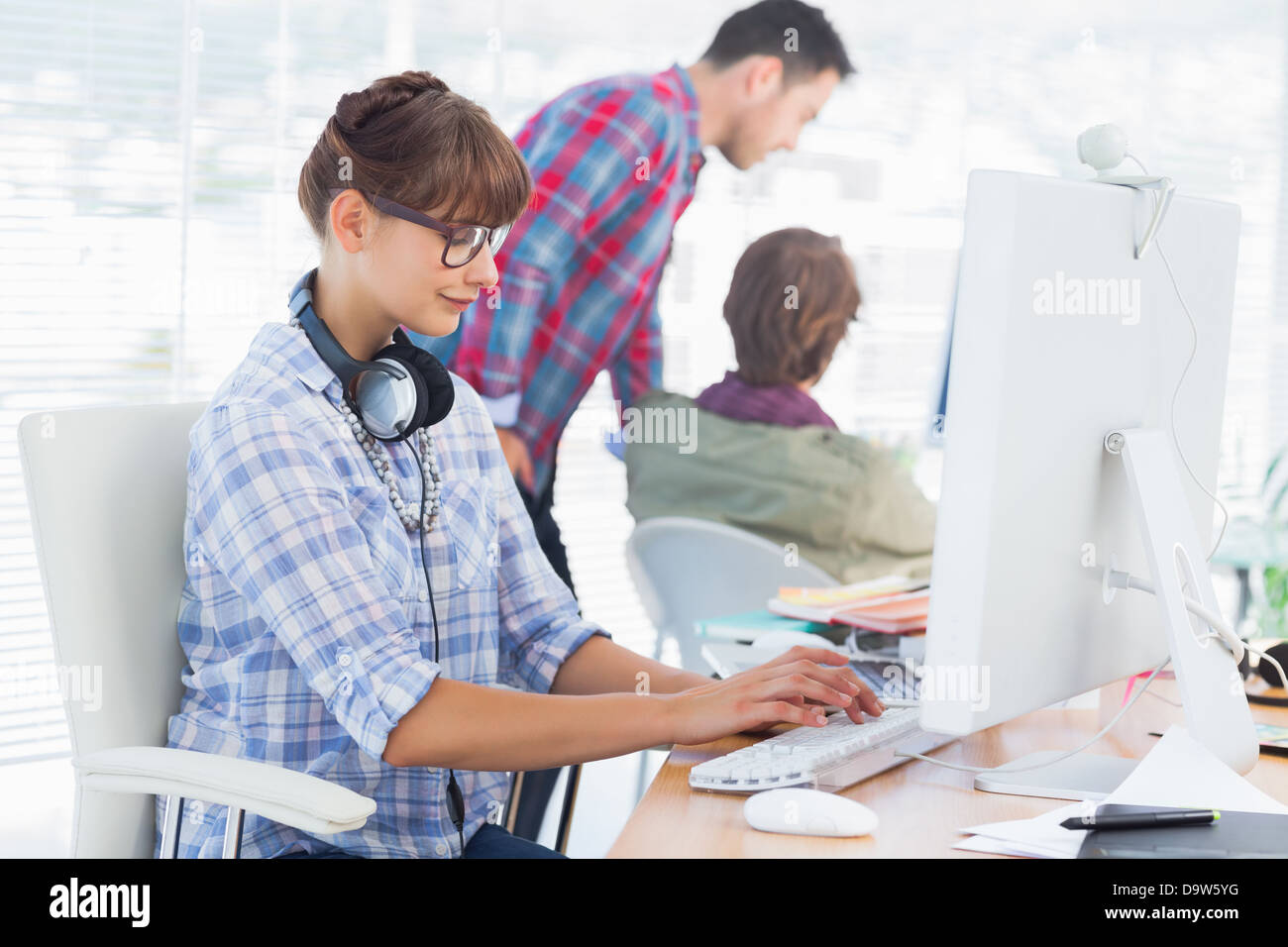 Designer working on computer Stock Photo - Alamy