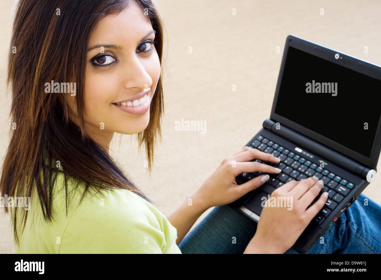 pretty young woman using laptop Stock Photo - Alamy