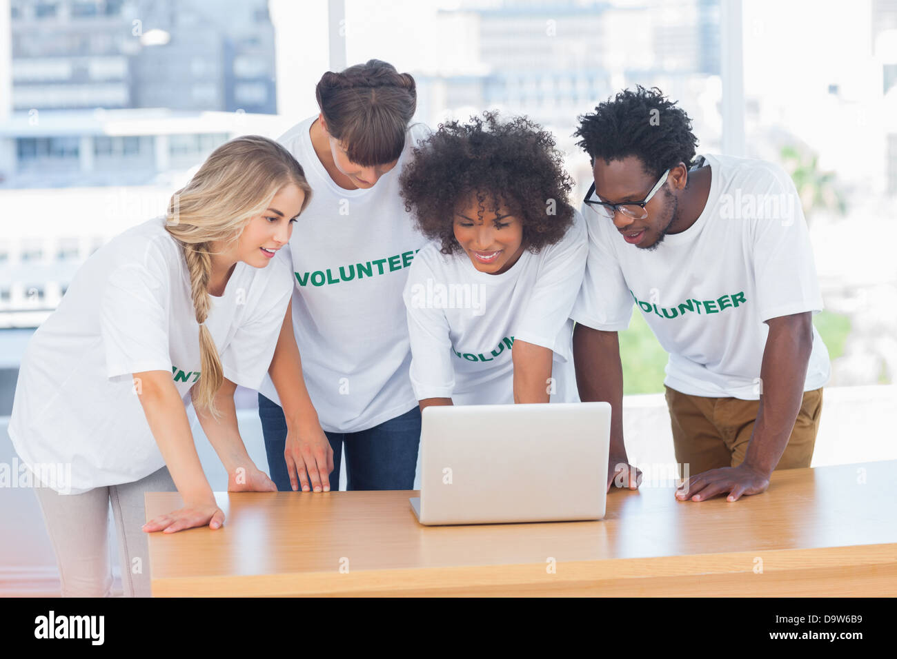 Charity working together hi-res stock photography and images - Alamy