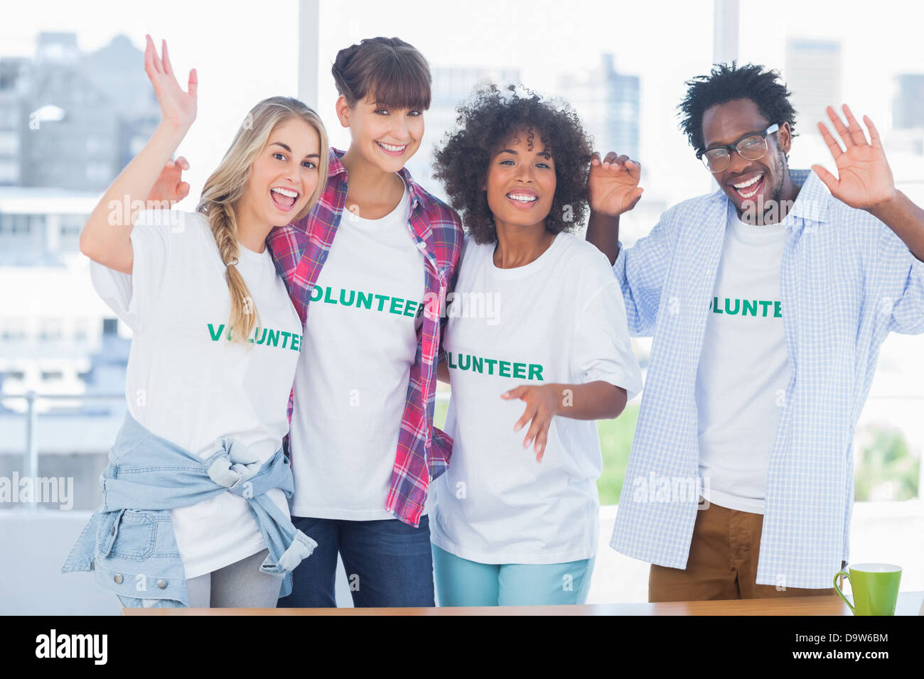 Greeting volunteers hi-res stock photography and images - Alamy