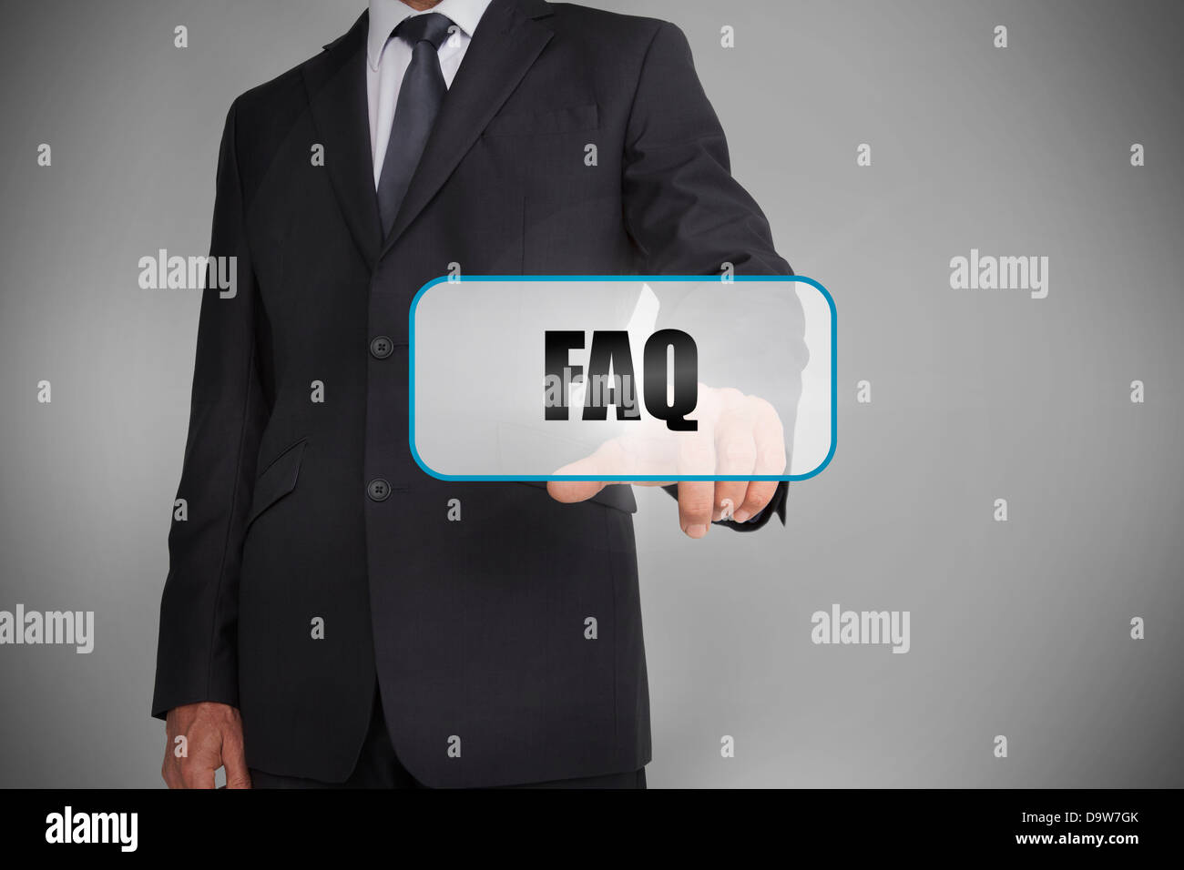 Businessman selecting tag with faq written on it Stock Photo - Alamy