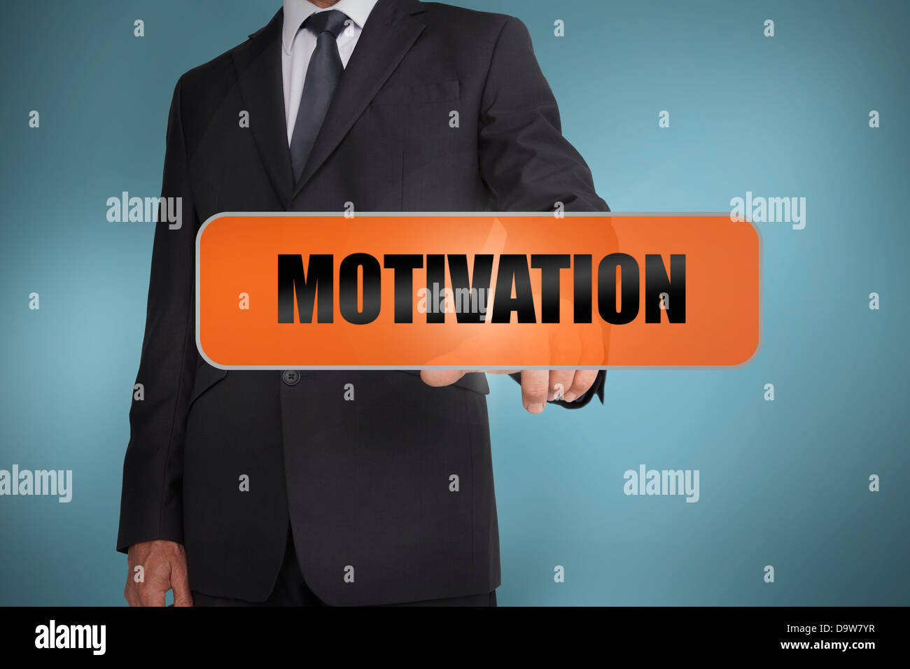 Businessman touching the word motivation Stock Photo - Alamy