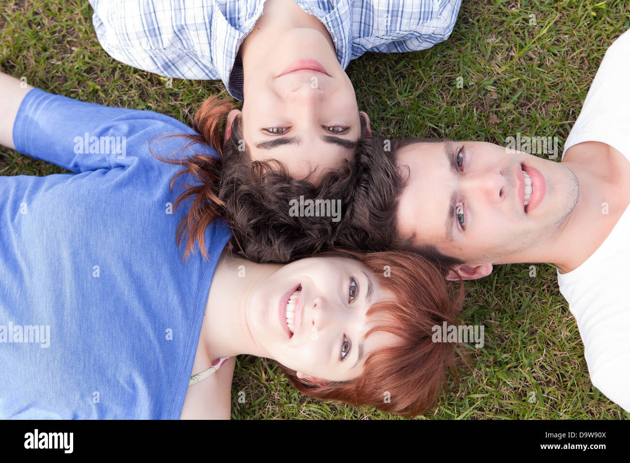 Happy group of friends relaxing at the park Stock Photo - Alamy