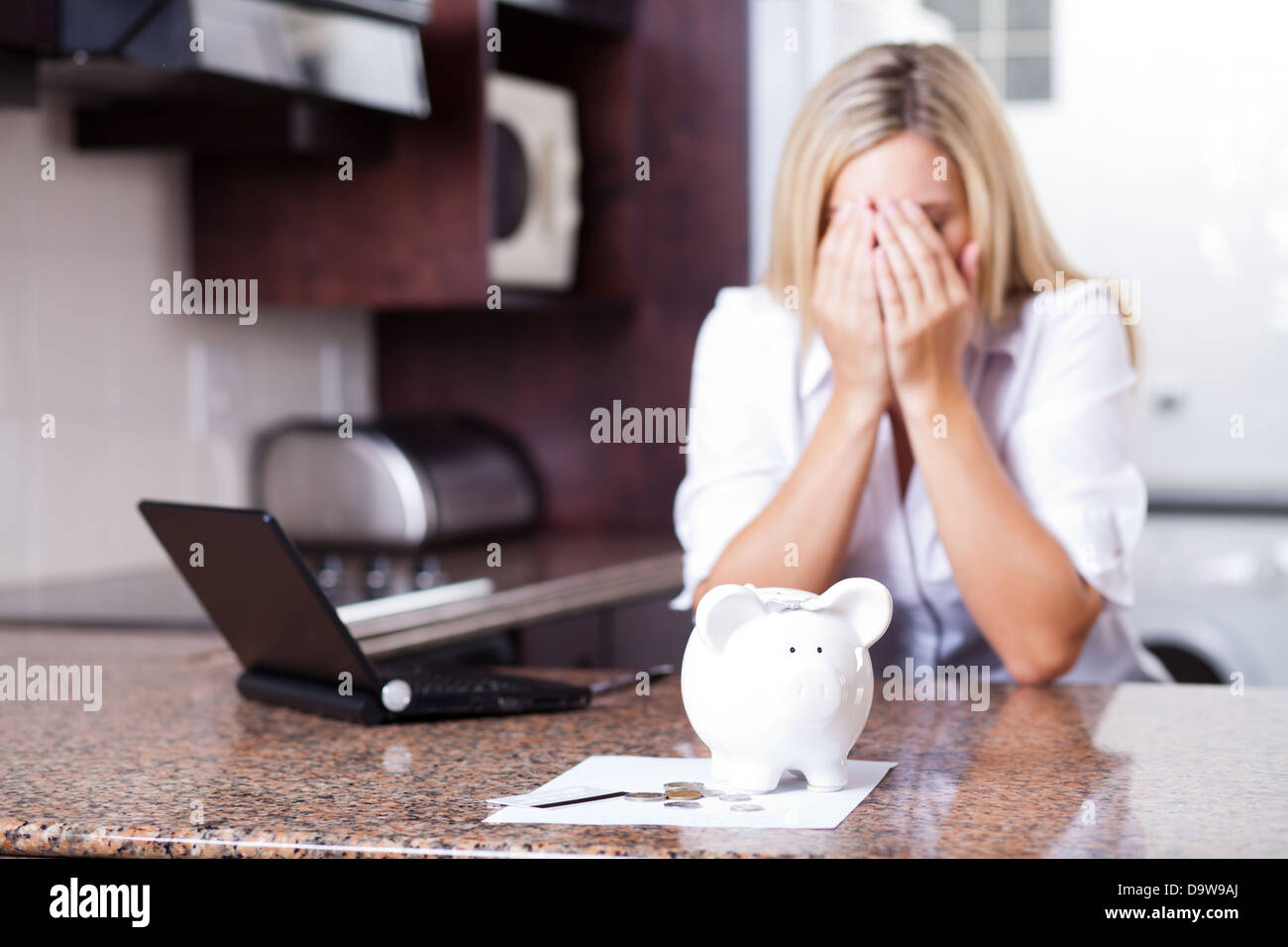 crying young woman having financial problems Stock Photo - Alamy