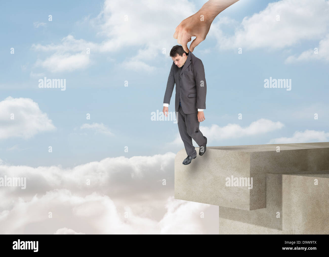 Giant hand dropping off a businessman over the clouds Stock Photo - Alamy