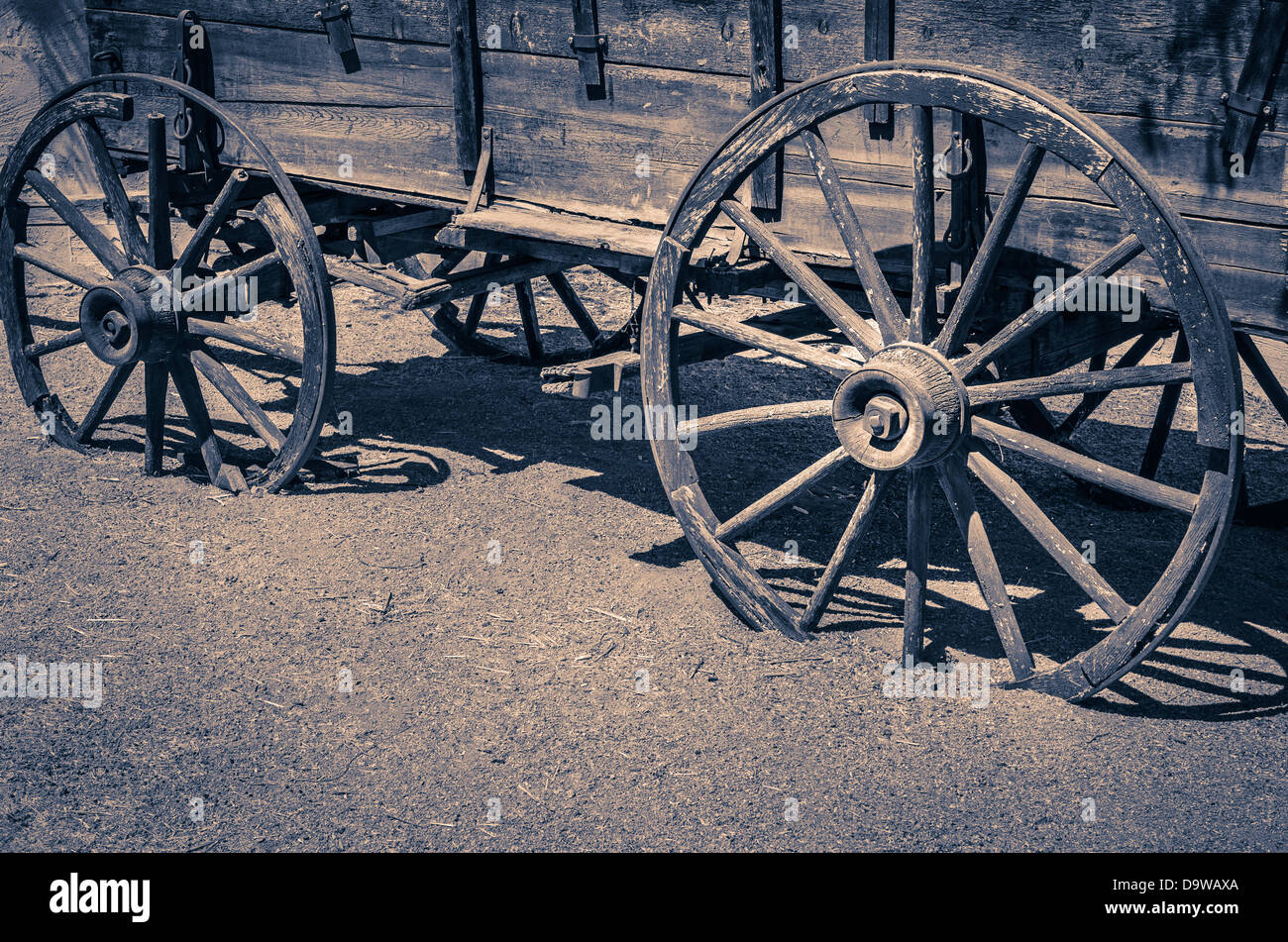 Vintage Cowboy Pioneer wild west wagon wheel Stock Photo - Alamy