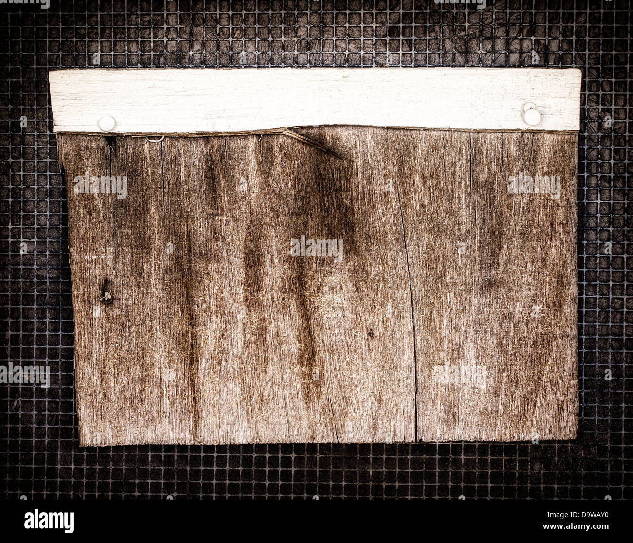 Grunge wooden background sign with wire mesh frame Stock Photo - Alamy