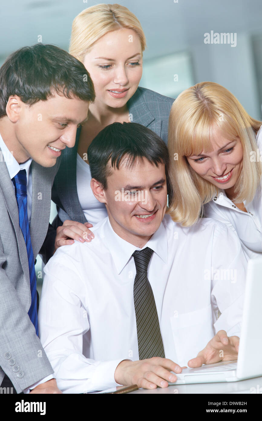 Four business people networking in office Stock Photo - Alamy
