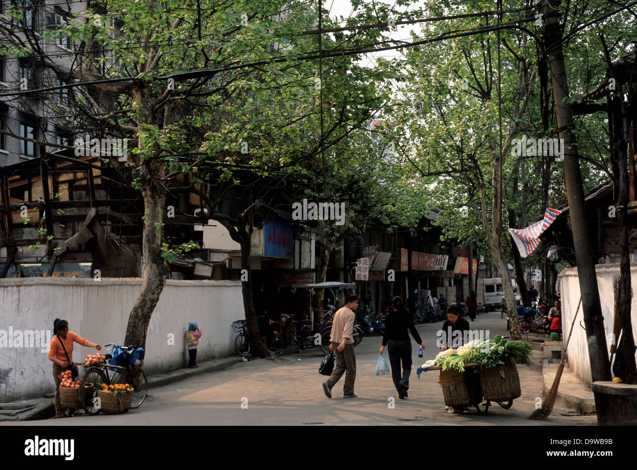 China, Sichuan Province, Chengdu, Street Scene With Old Houses Stock ...