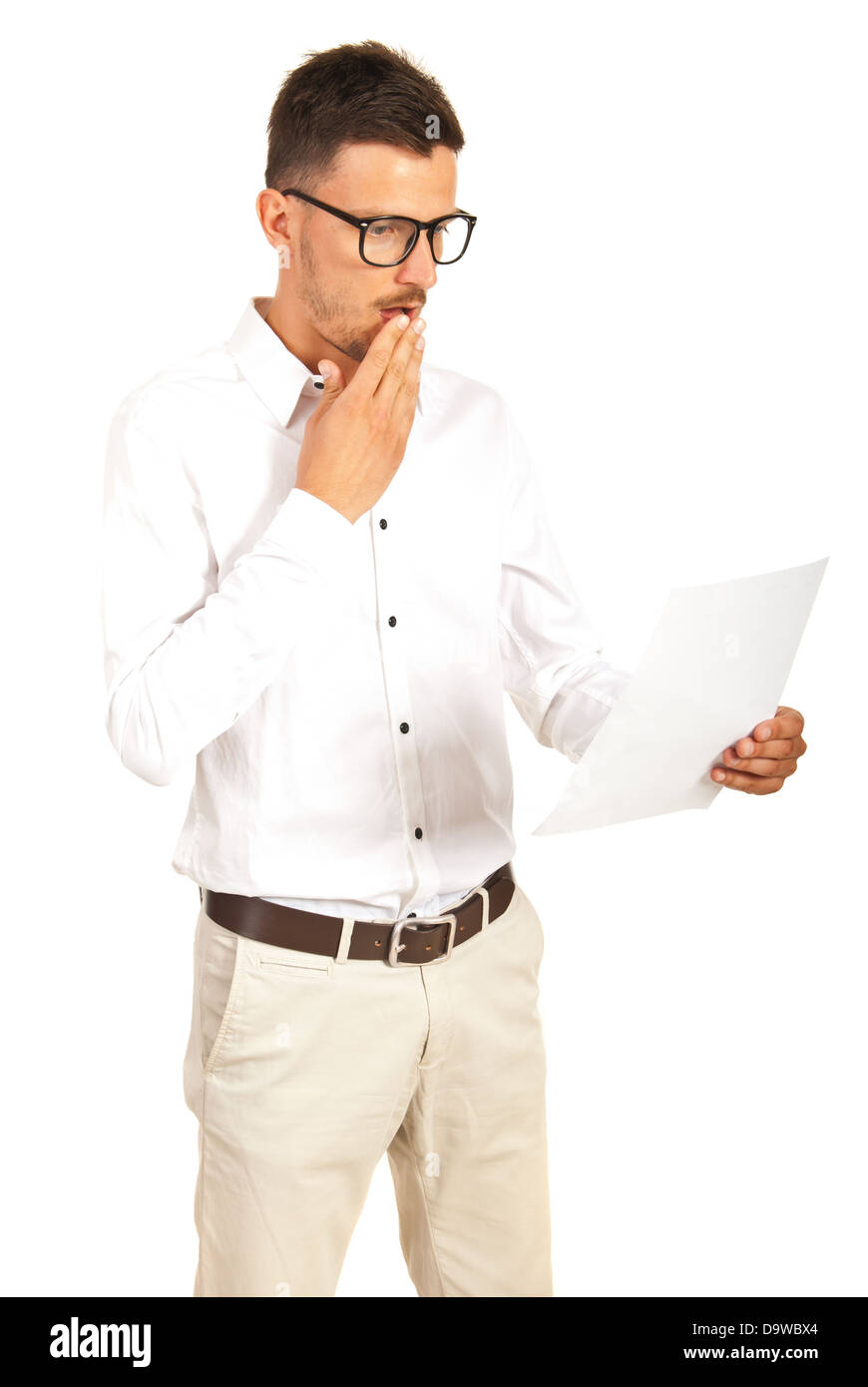 Amazed business man reading a paper isolated on white background Stock ...