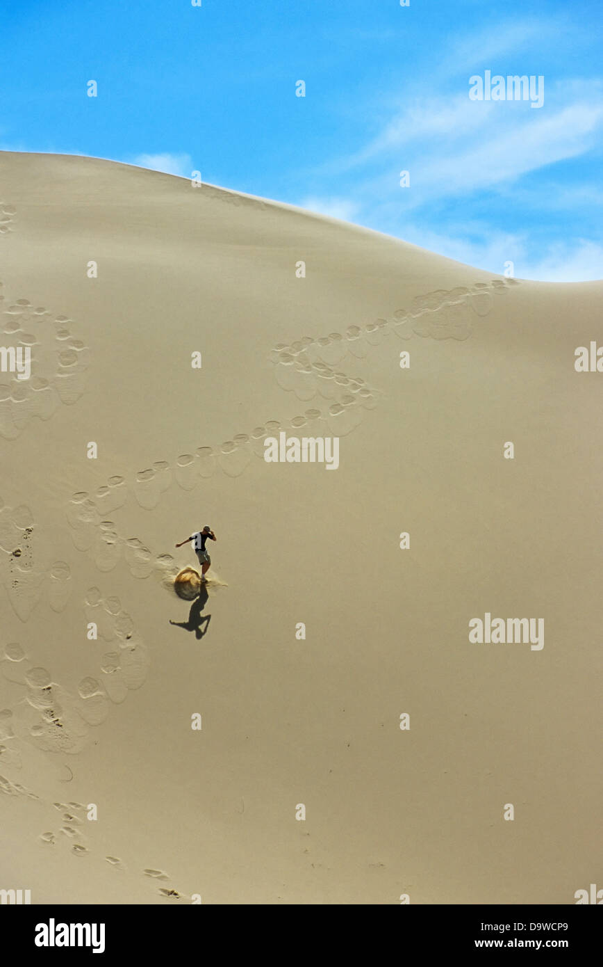Sliding down sand dune hi-res stock photography and images - Alamy