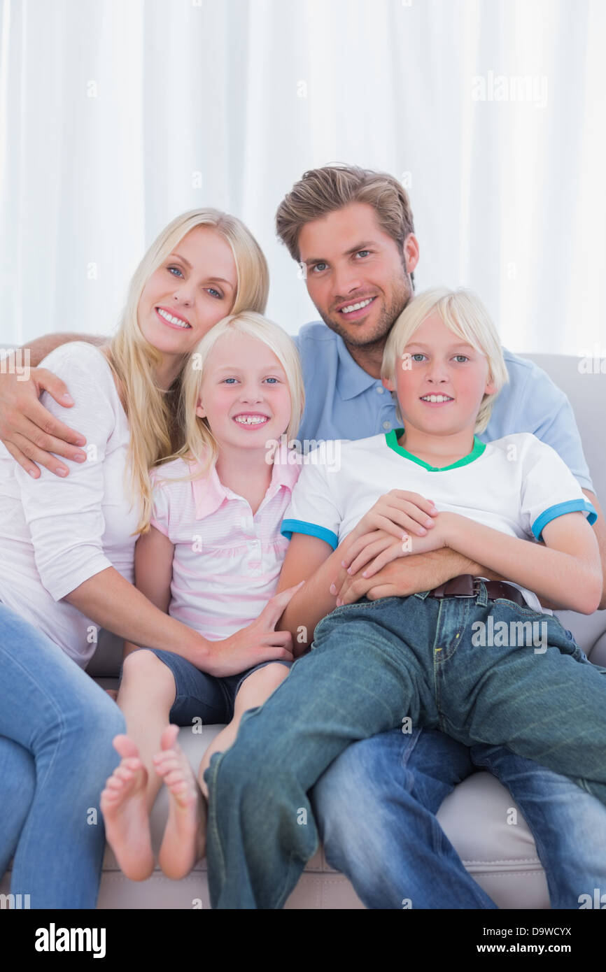 Parents sitting on couch hi-res stock photography and images - Alamy