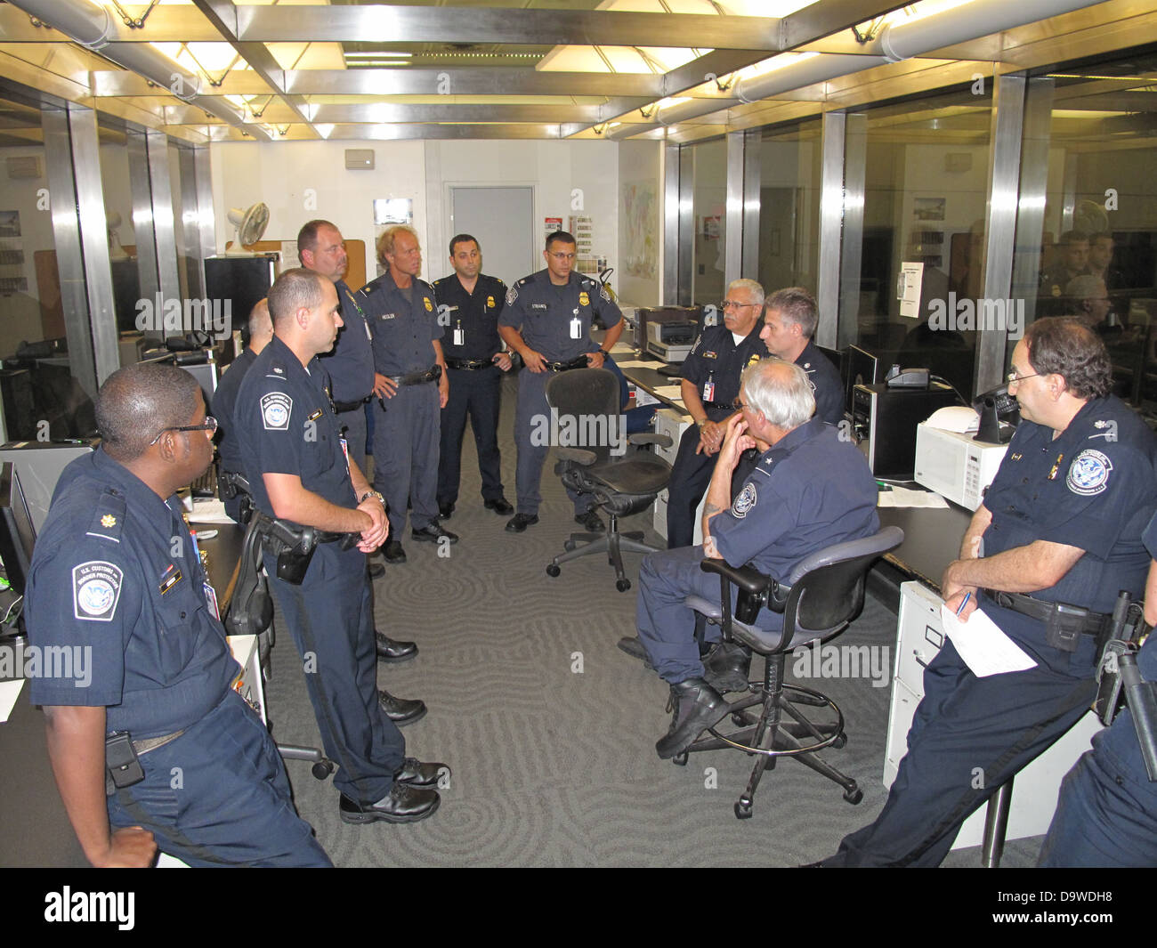 This image shows U.S. Customs and Border Protection (CBP) officers ...