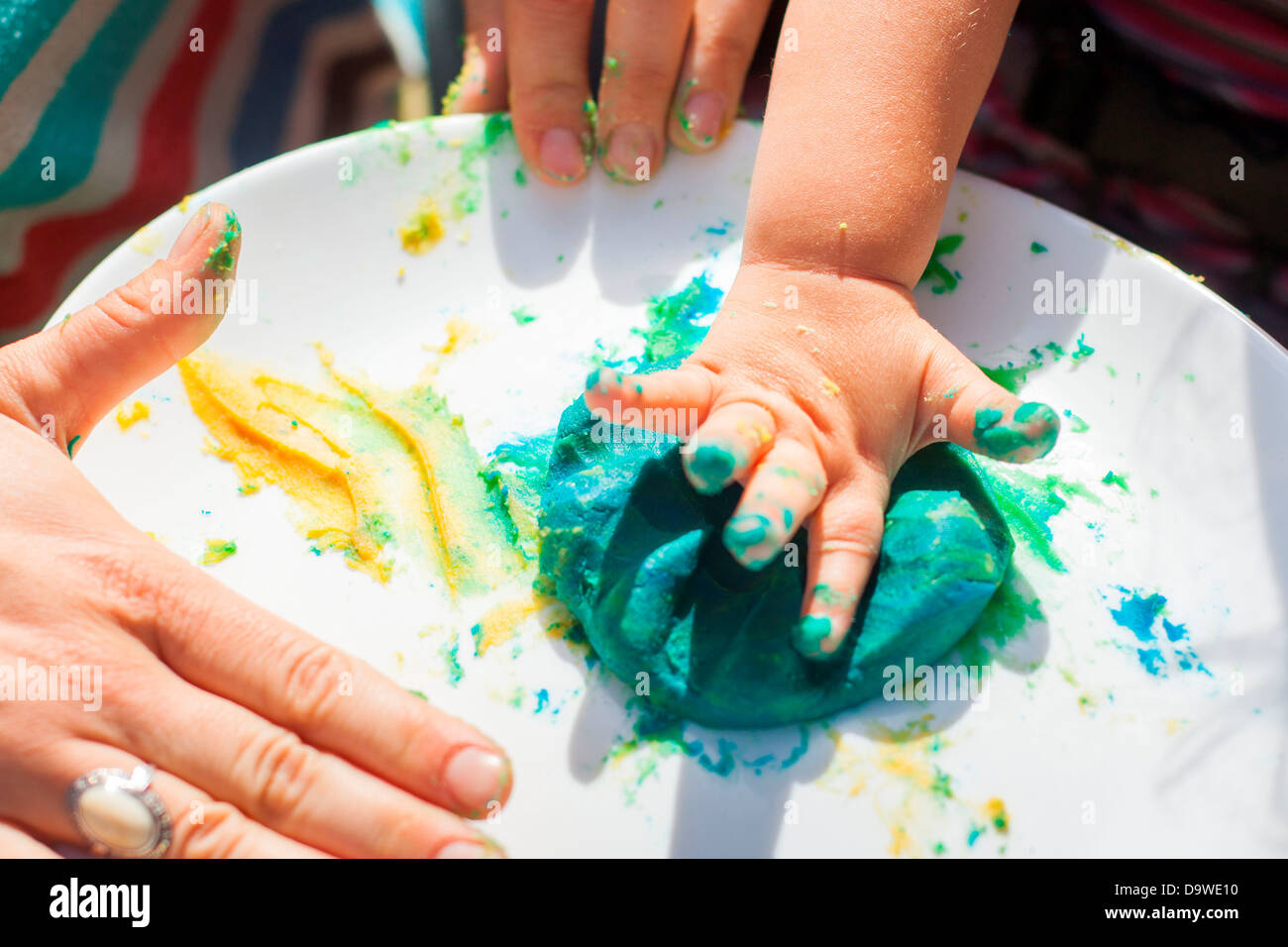 2 and a half year old girl with Down's syndrome with her mother Stock ...