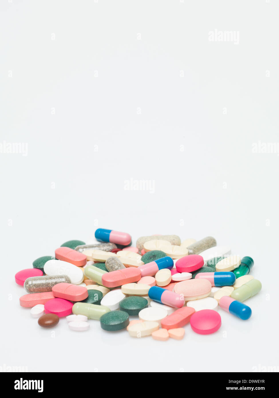 A group of different kind of pills isolated on white background. The ...