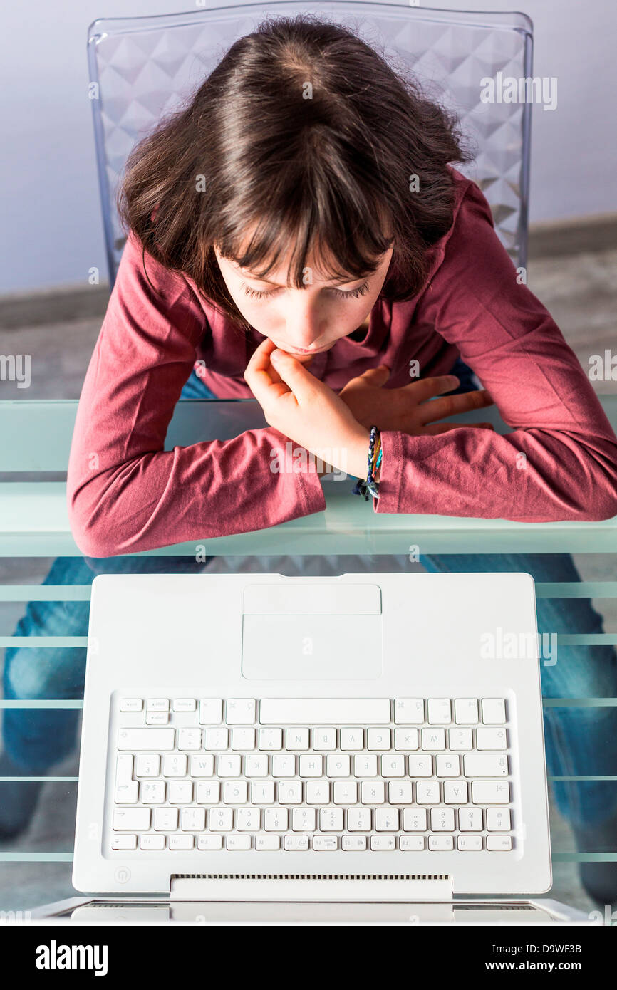 9-year-old girl using laptop computer Stock Photo - Alamy