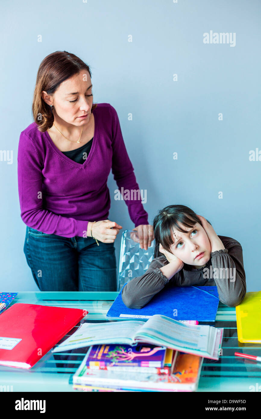 9 year old Girl Doing Her Homework With Her Mother Stock Photo Alamy 9-year-old-girl-doing-her-homework-with-her-mother-stock-photo-alamy