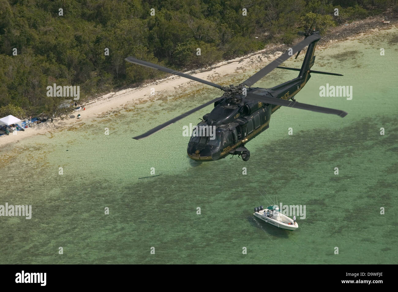 This image features U.S. Customs and Border Protection agents in a ...