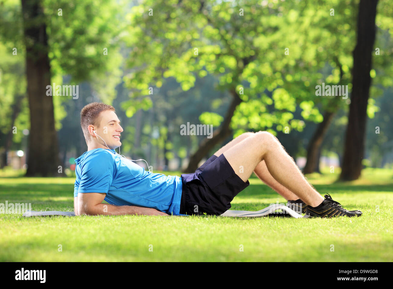 Man lying on mat hi-res stock photography and images - Alamy