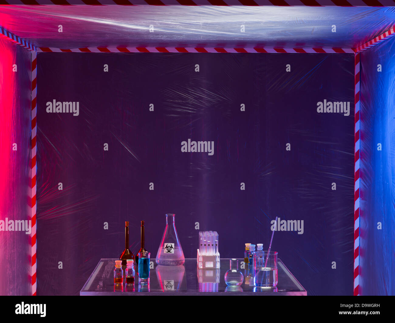 different glass containers filled with differently colored liquids on a ...